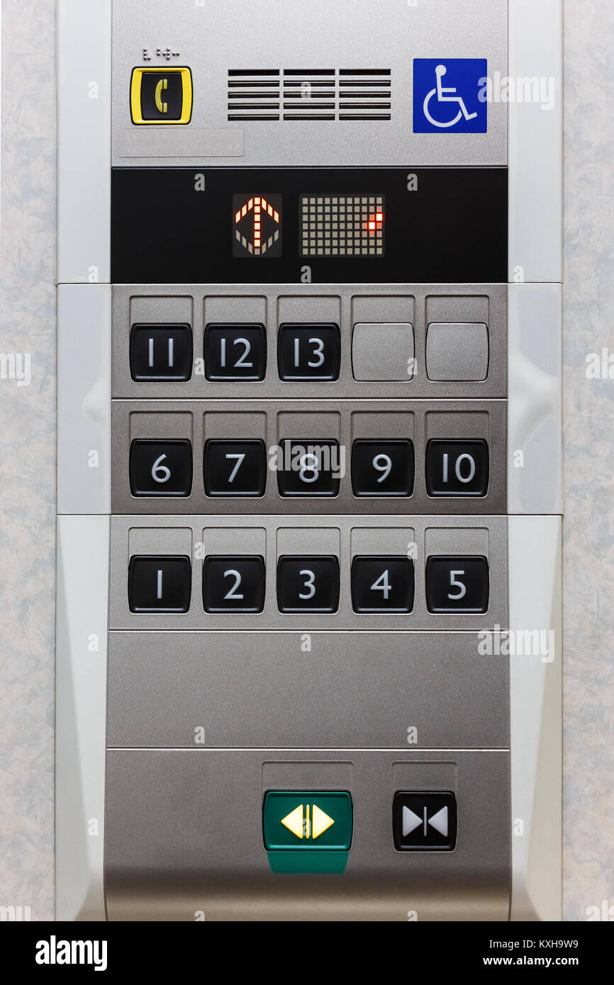 Elevator panel with push buttons for normal people and hadicapped ...