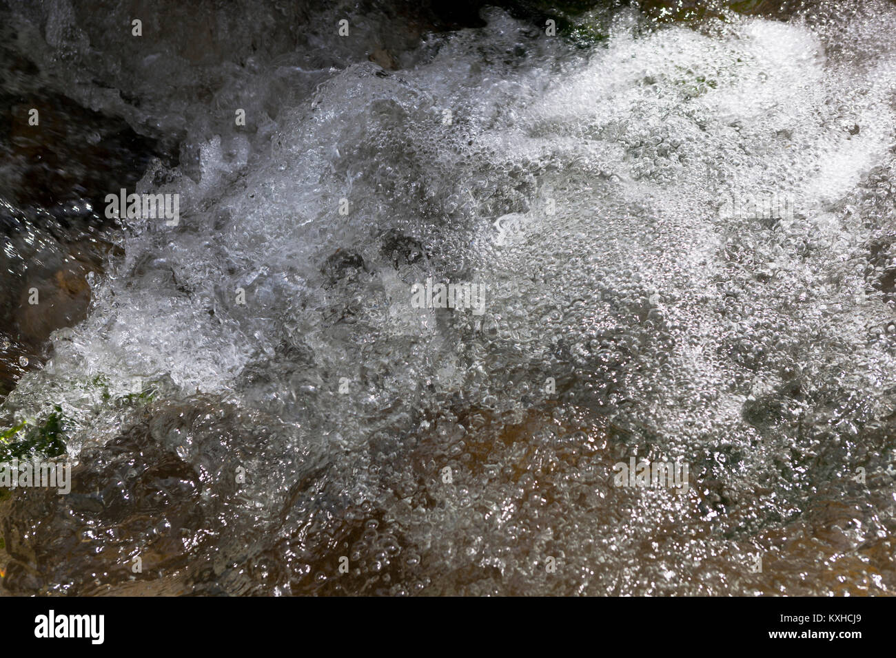 Boiling water in the mountain river Stock Photo - Alamy