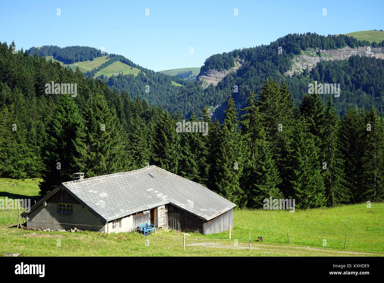 Big barn on the slope of mount in Switzerland Stock Photo - Alamy