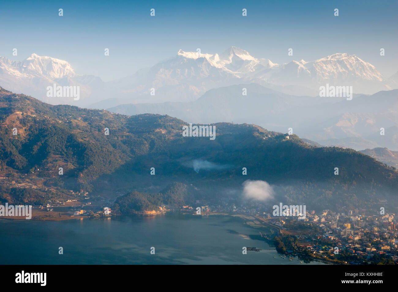 Scenic view over Phewa Lake and Pokhara with the Annapurna mountains in ...