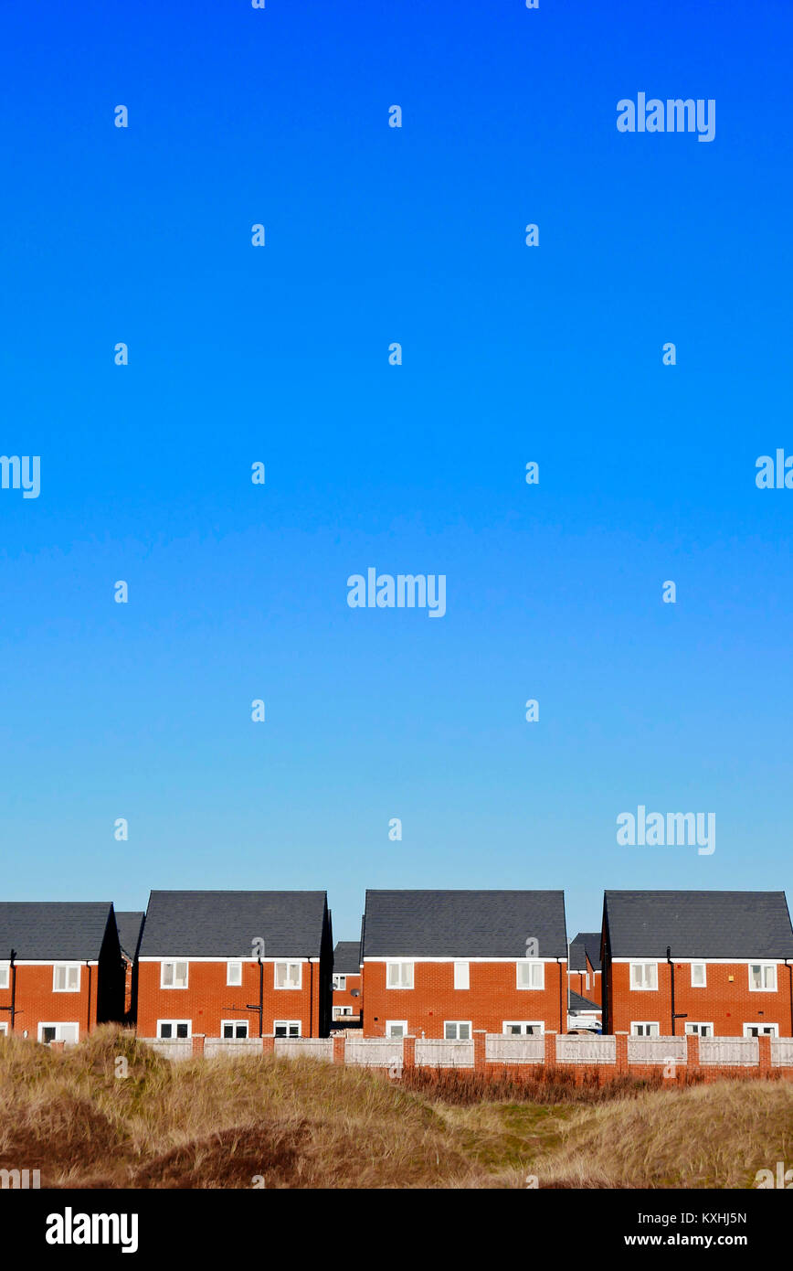 Row of same houses hi-res stock photography and images - Alamy