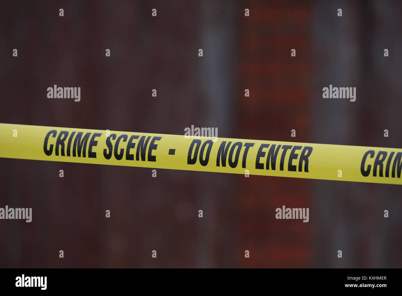 A generic stock photo of crime scene tape at a murder investigation ...