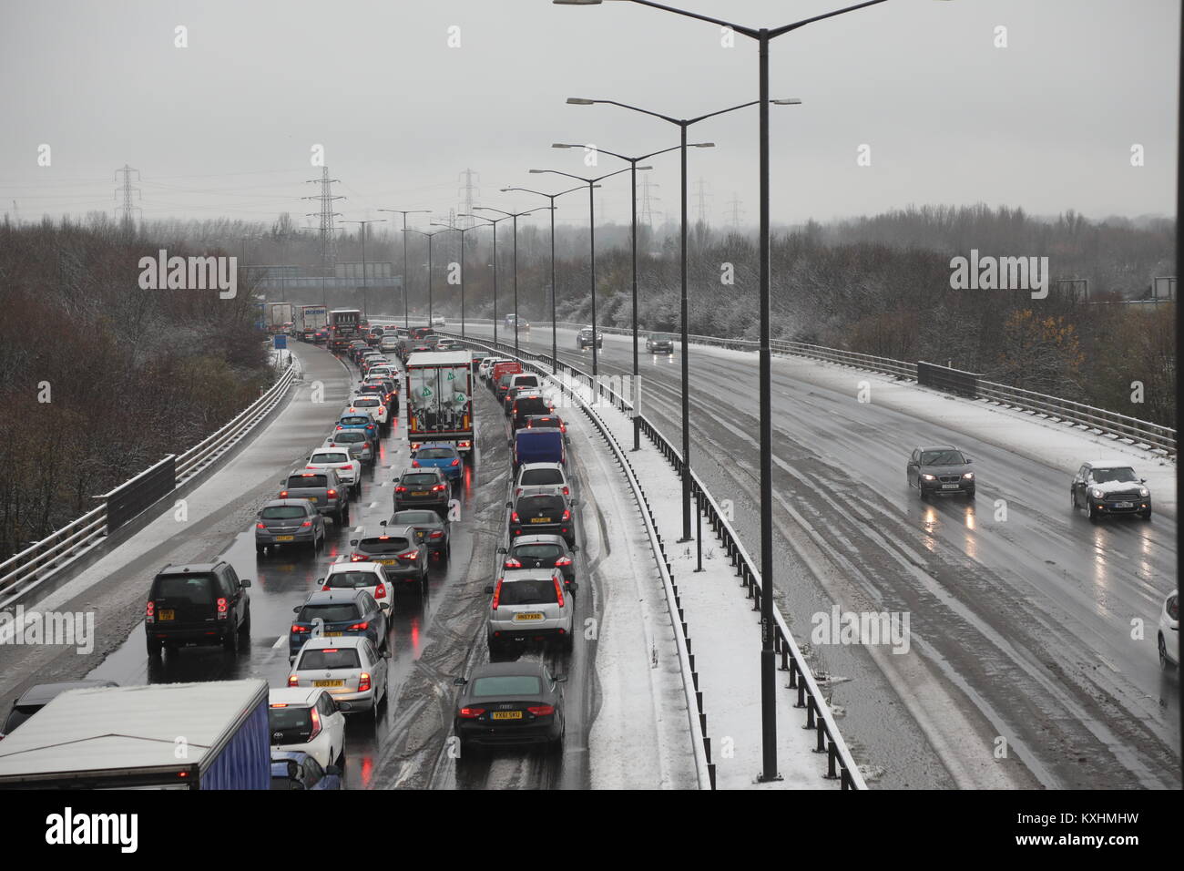 Snow on the M25 motorway with solid traffic. Where: United Kingdom When ...