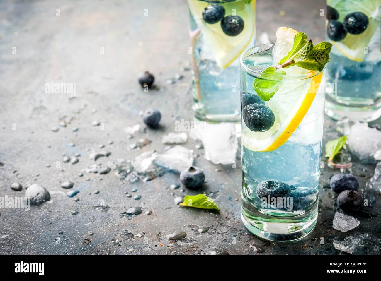 Summer refreshment drinks, Blueberry Lemonade or mojito cocktail with ...