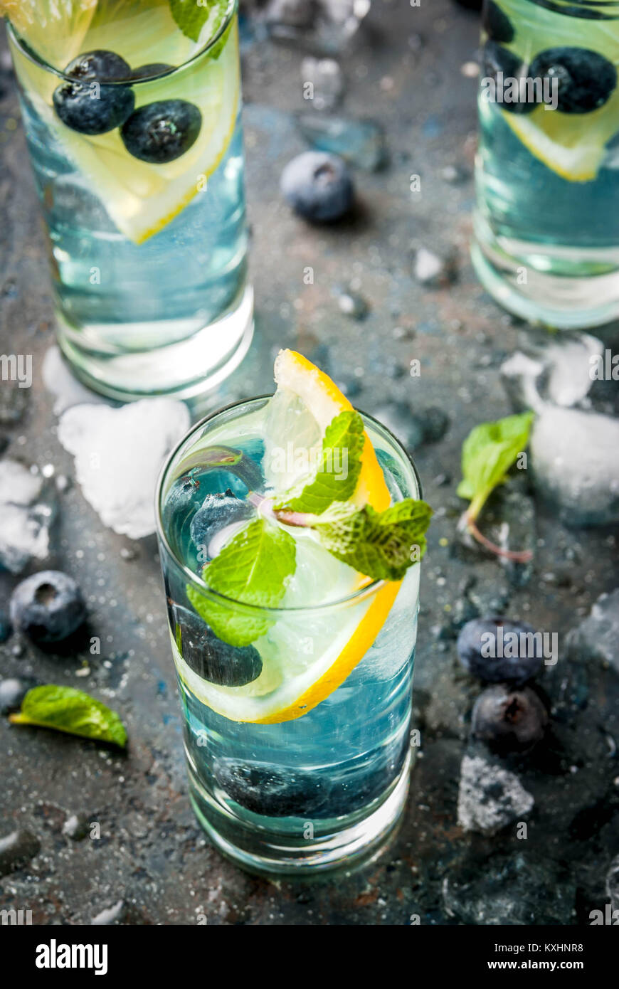 Summer refreshment drinks, Blueberry Lemonade or mojito cocktail with ...