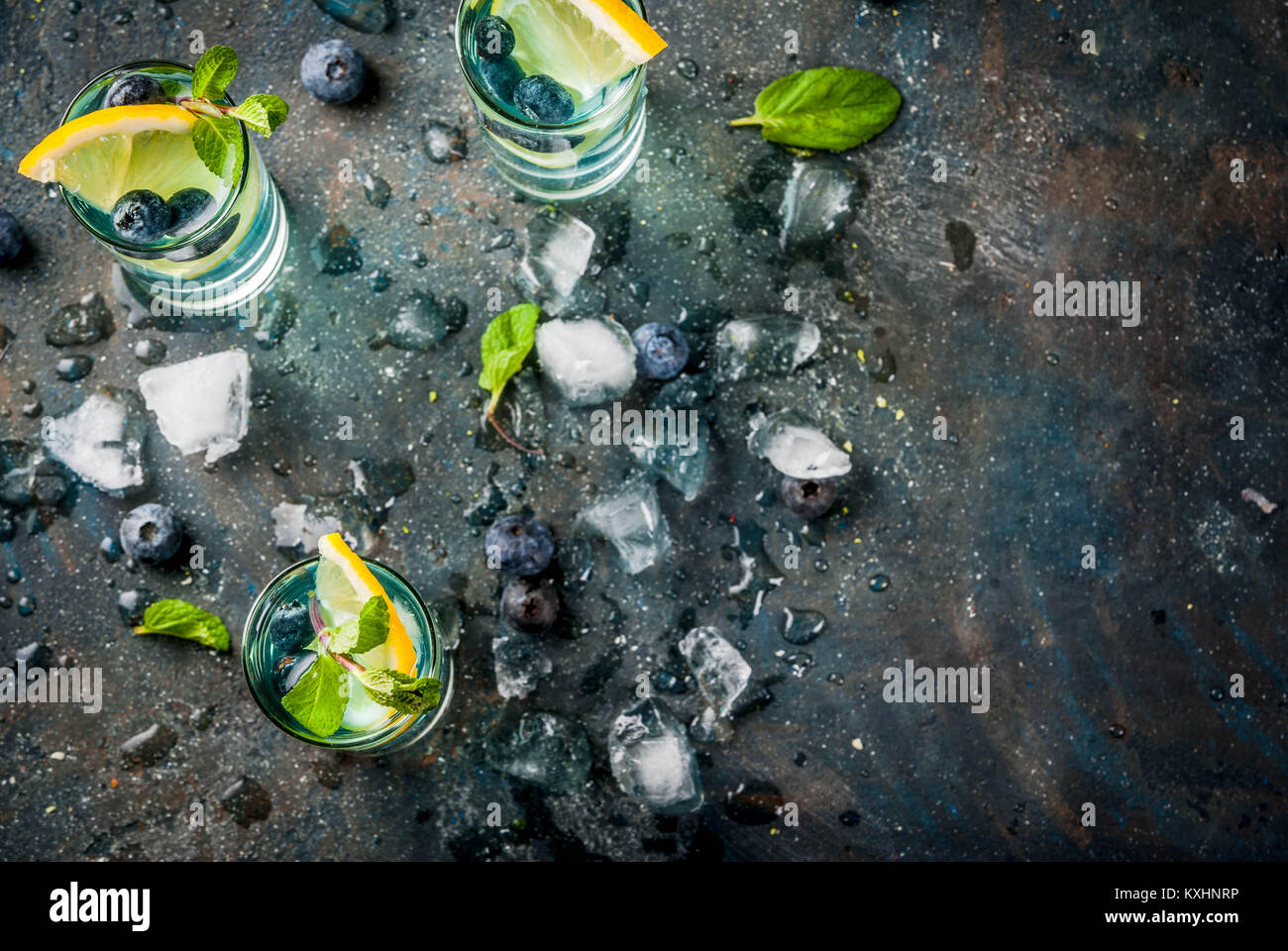 Summer refreshment drinks, Blueberry Lemonade or mojito cocktail with ...