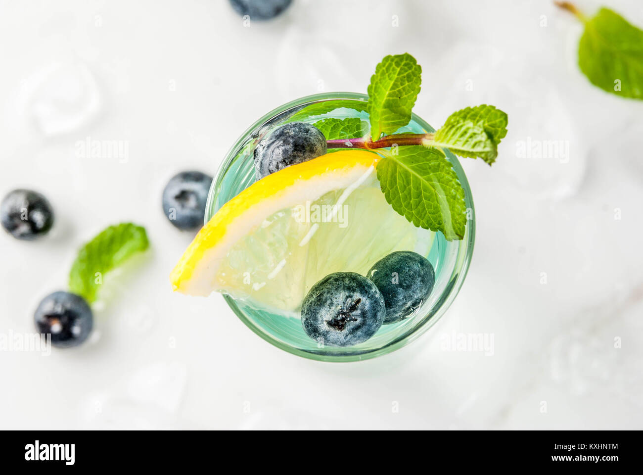 Summer refreshment drinks, Blueberry Lemonade or mojito cocktail with ...