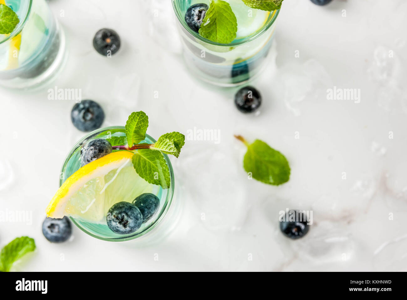 Summer refreshment drinks, Blueberry Lemonade or mojito cocktail with ...