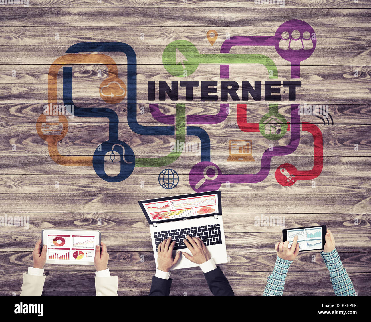Group of three people with devices in hands working together as symbol ...