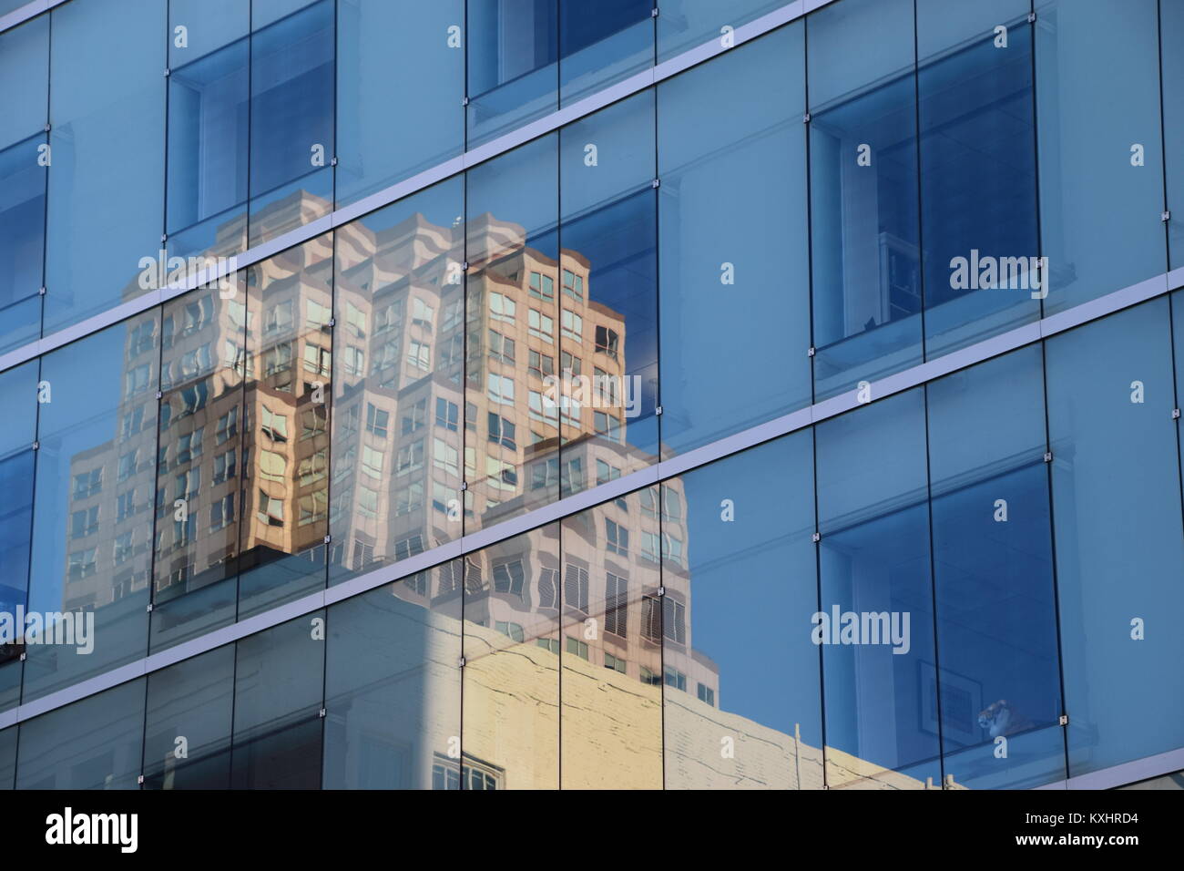 Reflections of high-rise buildings in the Financial District, San ...