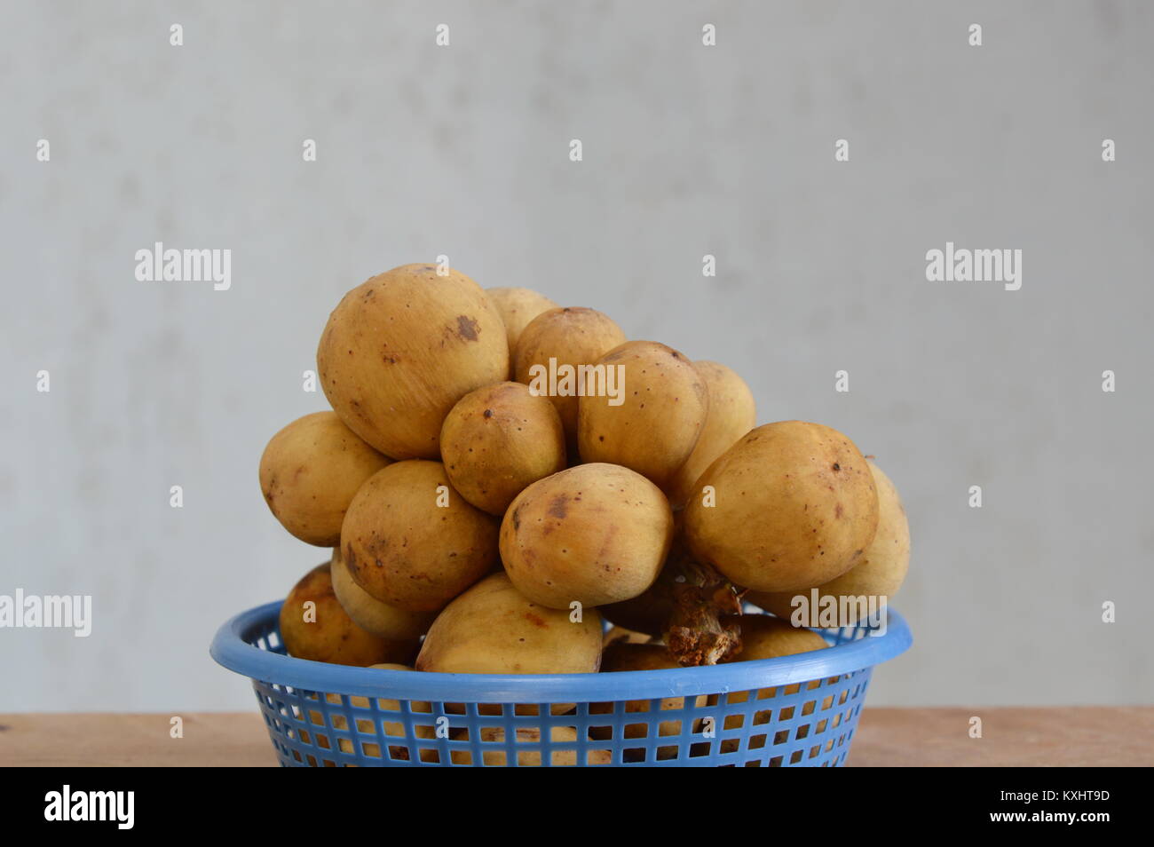 Langsat Asean fruit on basket Stock Photo - Alamy