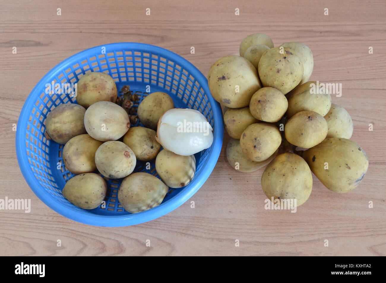 Langsat Asean fruit on basket Stock Photo - Alamy