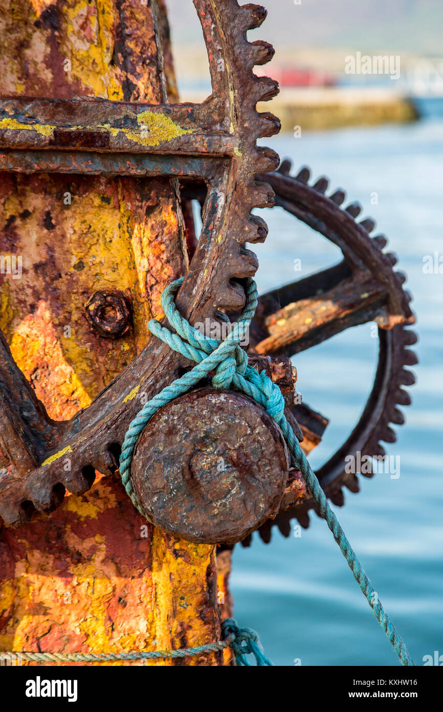 Rusted cogs on a dockyard winch, Valentia Island, County Kerry Ireland ...
