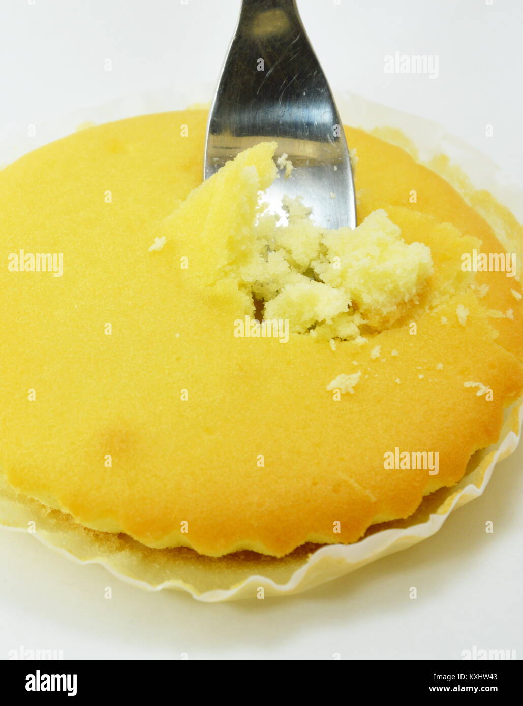 fork on butter cake Stock Photo - Alamy