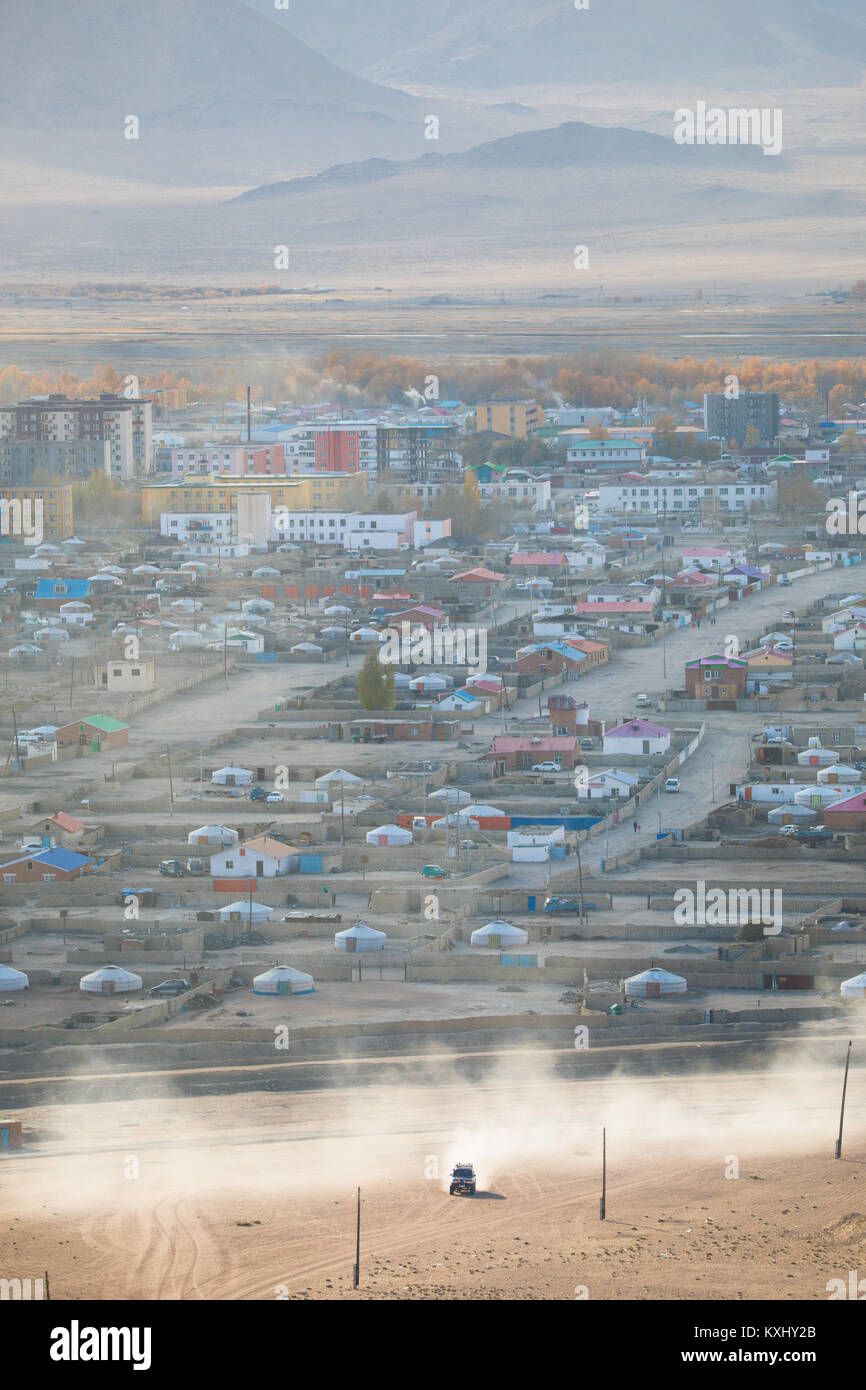 Khovd Hovd town city sunset smoke chimneys burning coal to stay warm ...