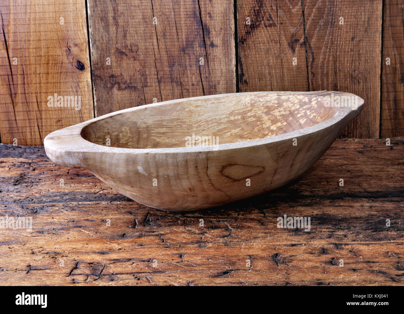 close on empty wooden bowl on brow and rustic plank Stock Photo - Alamy