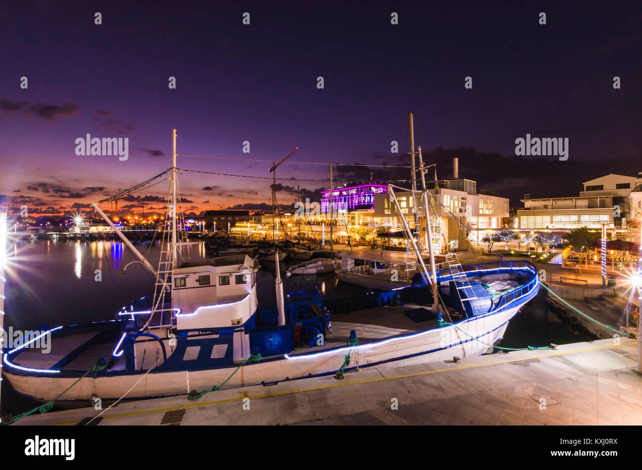 Fishing boat docked at the Limassol old port in Cyprus, next to the ...