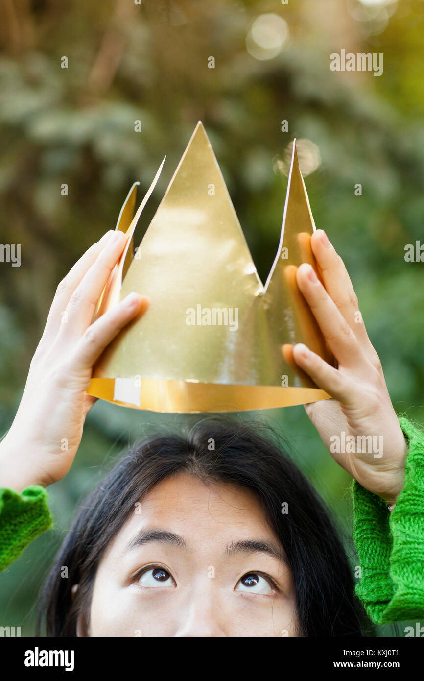 Wearing paper crown hi-res stock photography and images - Alamy