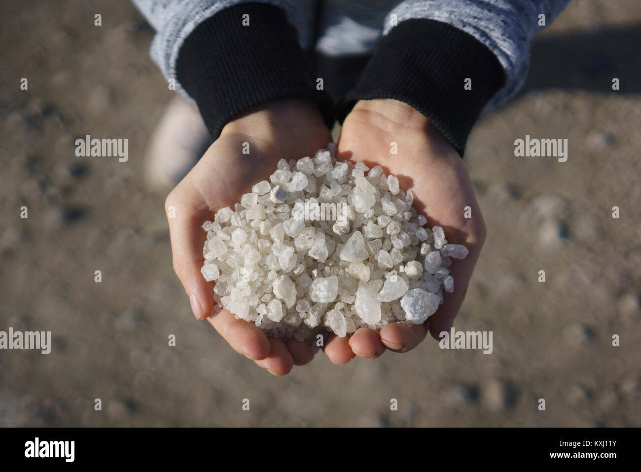 Close up hands holding salt hi-res stock photography and images - Alamy