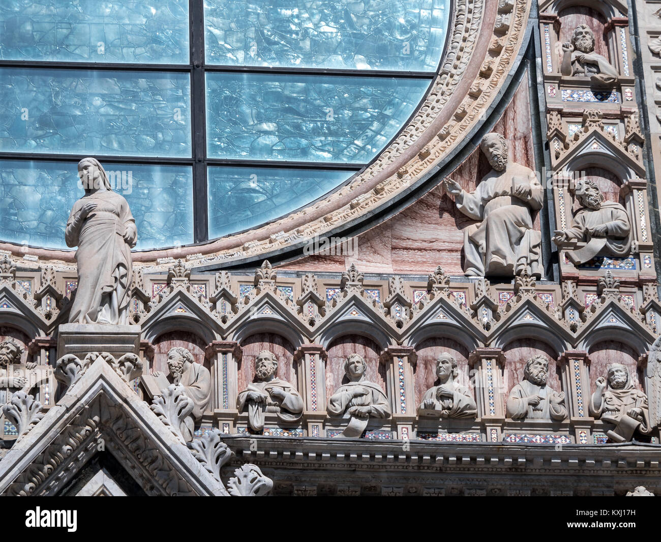 Statues at the west facade of Siena cathedral Stock Photo - Alamy