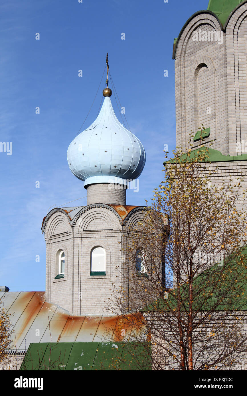 Onion shape cupola and green roof of new russian church in Murmansk ...