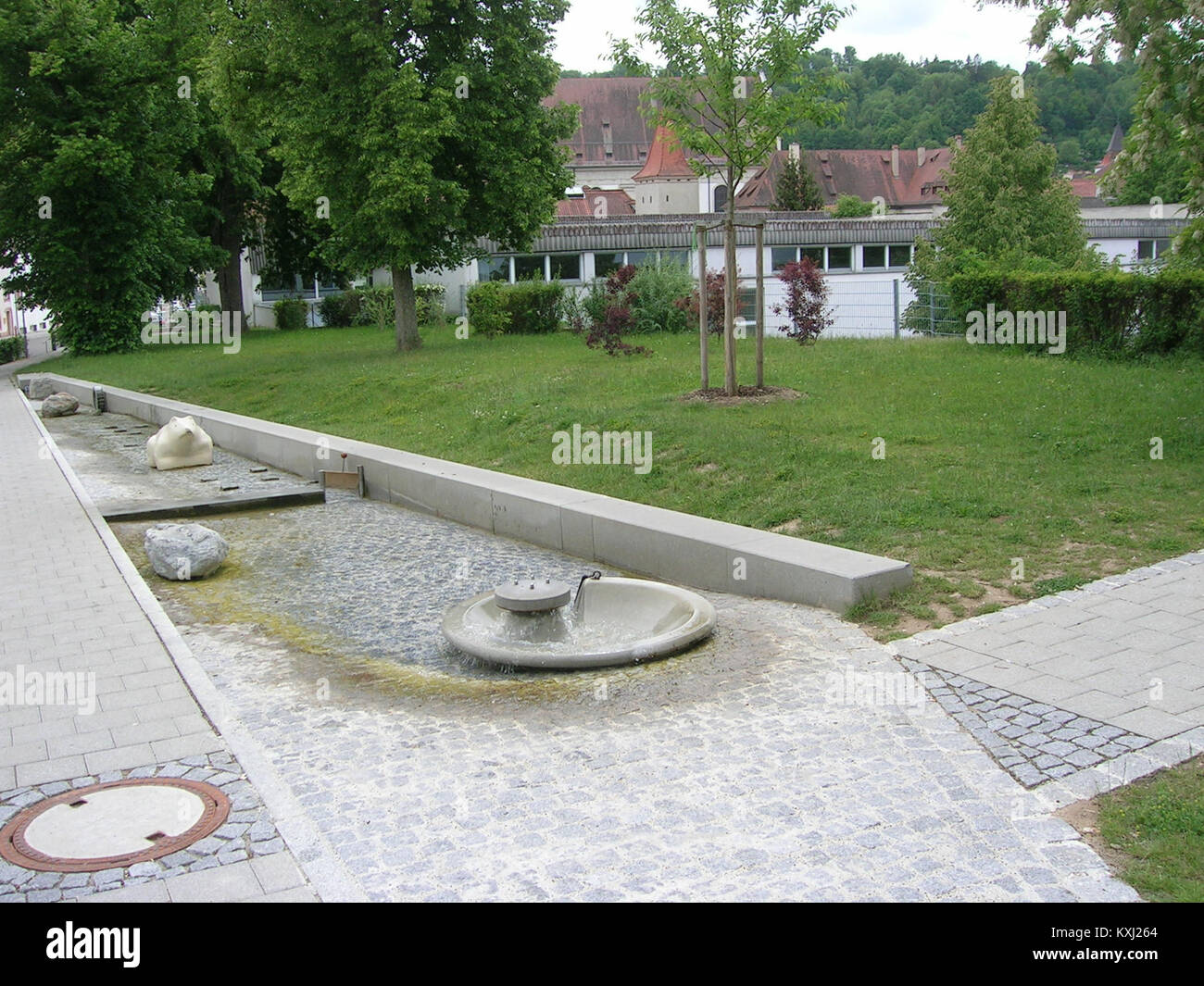 Photograph of a watercourse ‘Am Graben’ in Eichstätt, showing a narrow ...