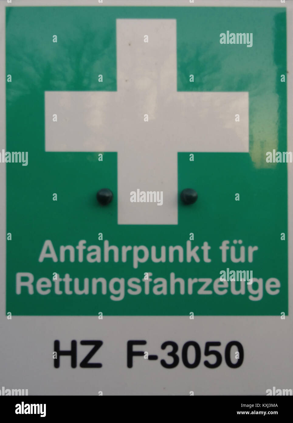 A sign indicating the designated starting point for emergency vehicles ...