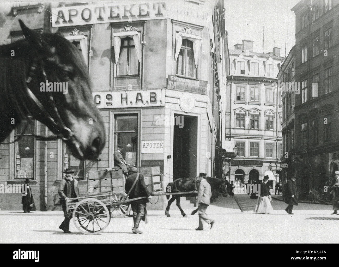 This historical photograph features the Apoteket Ängeln pharmacy in ...