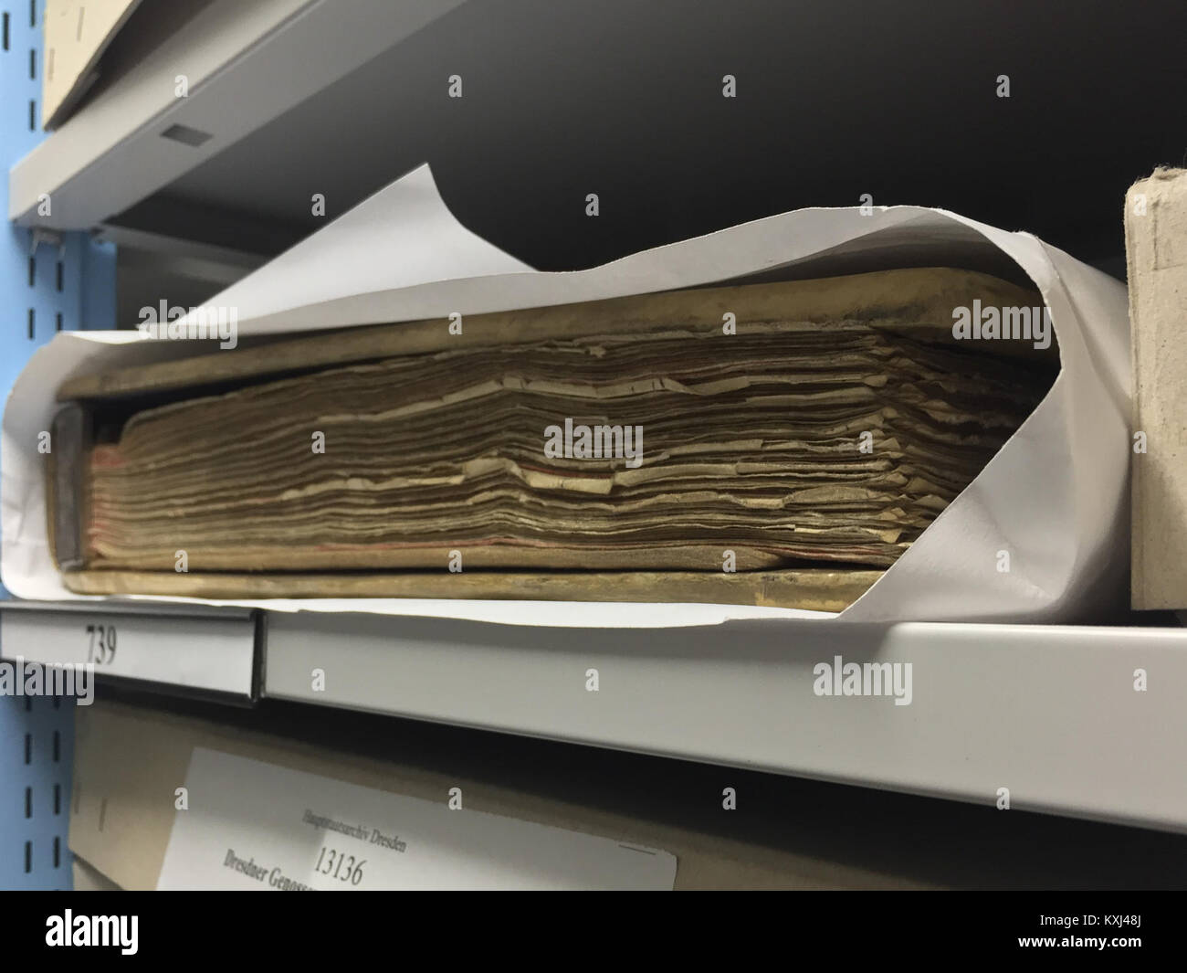 This image depicts the archival shelves at the Saxon State Archives in ...
