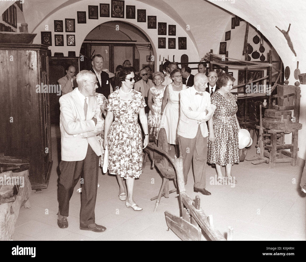 A black-and-white photograph from 1962 depicting Alpine tourists ...