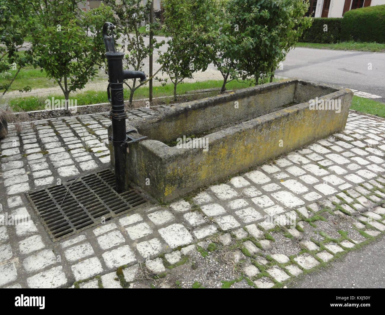 Public french water pump hi-res stock photography and images - Alamy