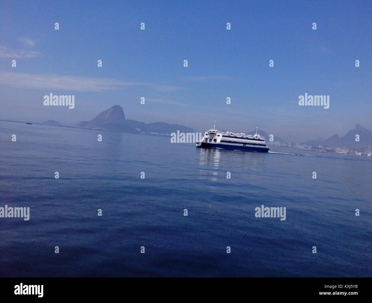 This image shows a boat in the Guanabara Bay, located in Rio de Janeiro ...