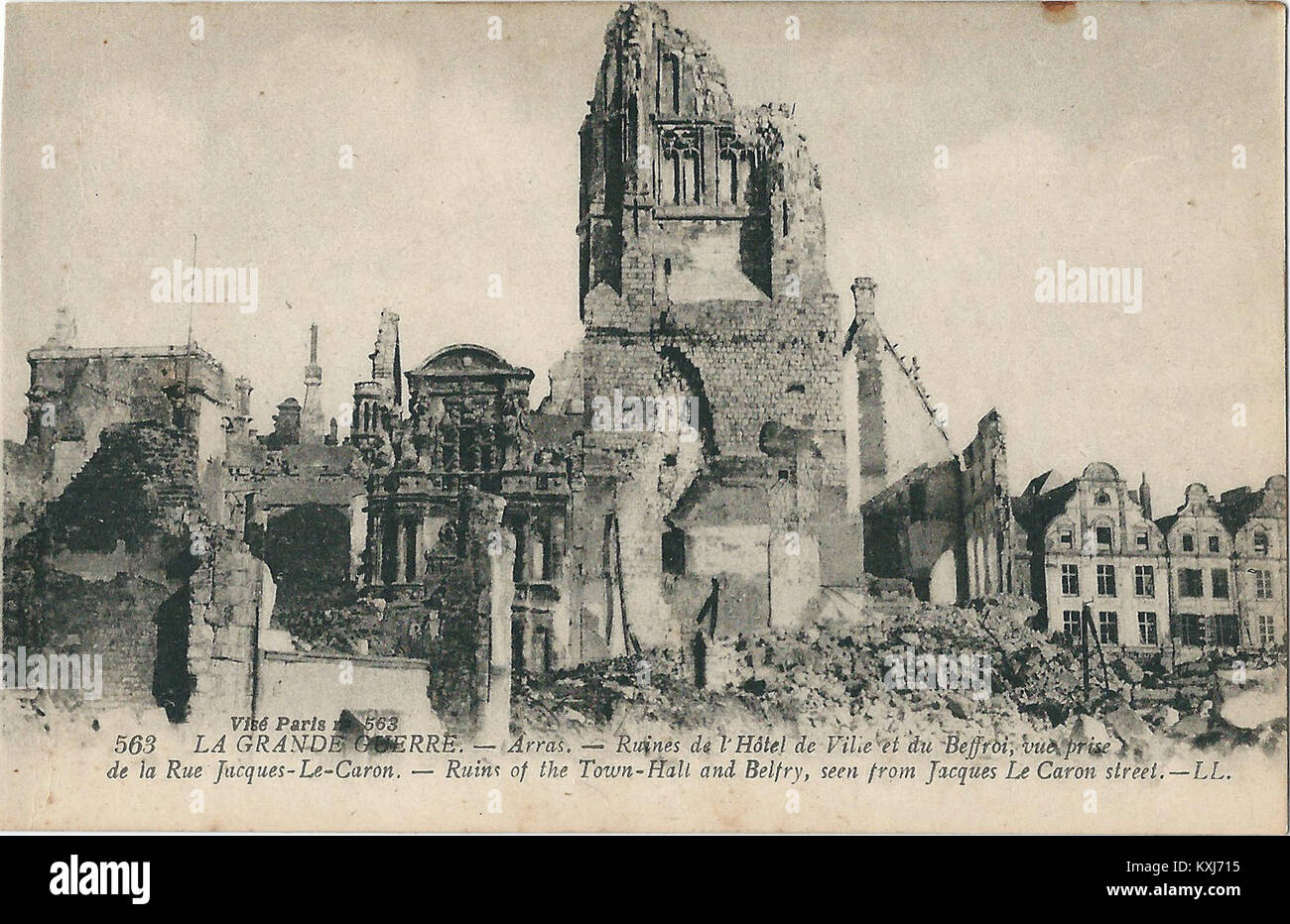 The photograph captures the Hôtel de Ville in Arras, France ...