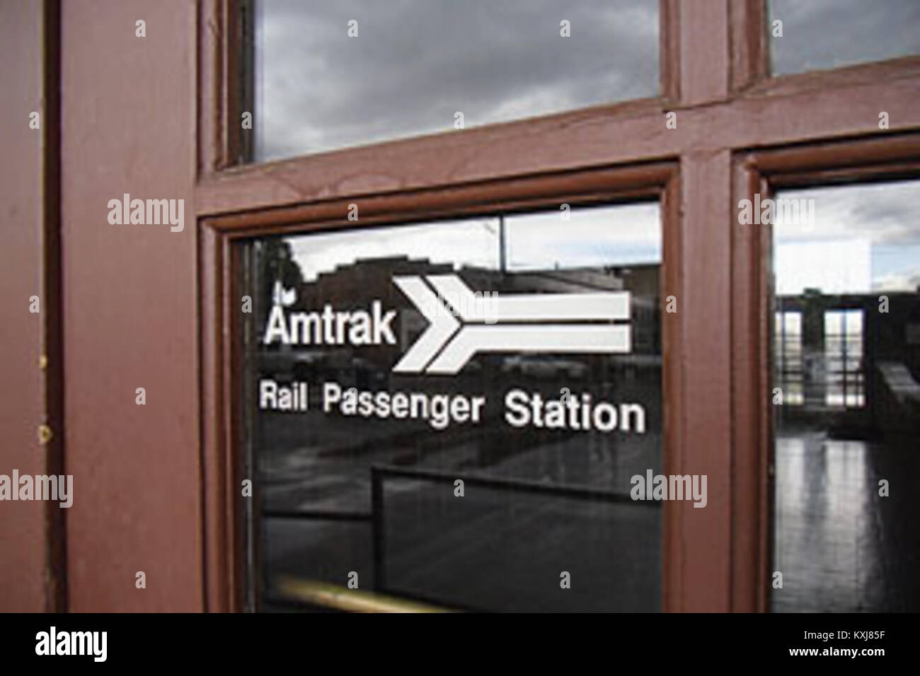 This image shows an Amtrak sign at the Laramie train station in Wyoming ...
