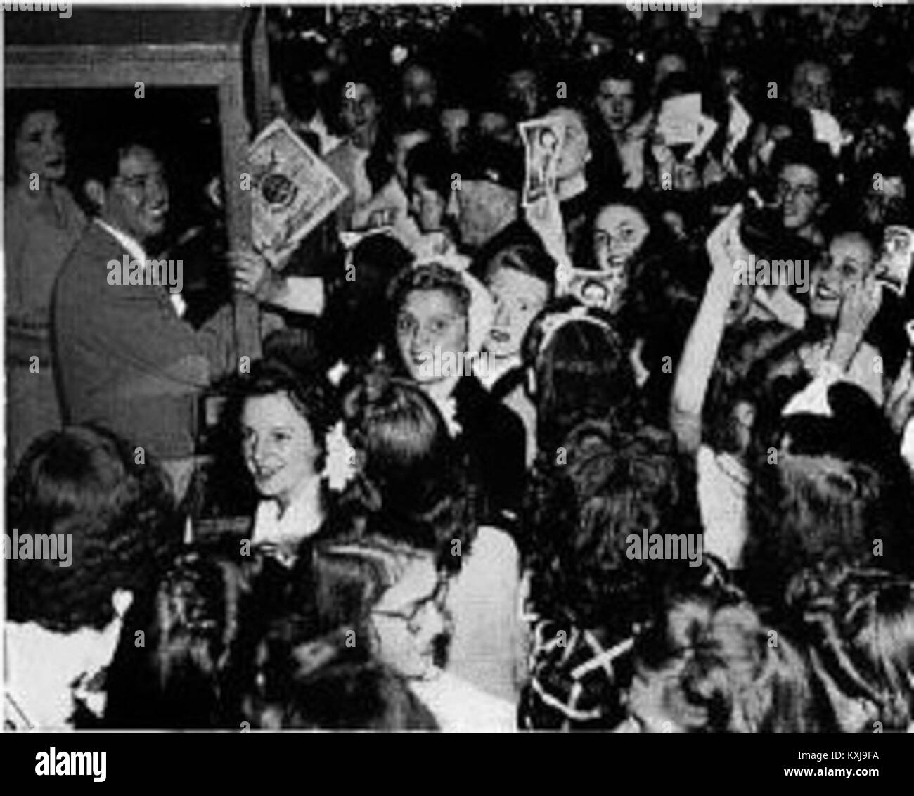 A photo of Andy Russell during an autograph session in 1944. Russell ...