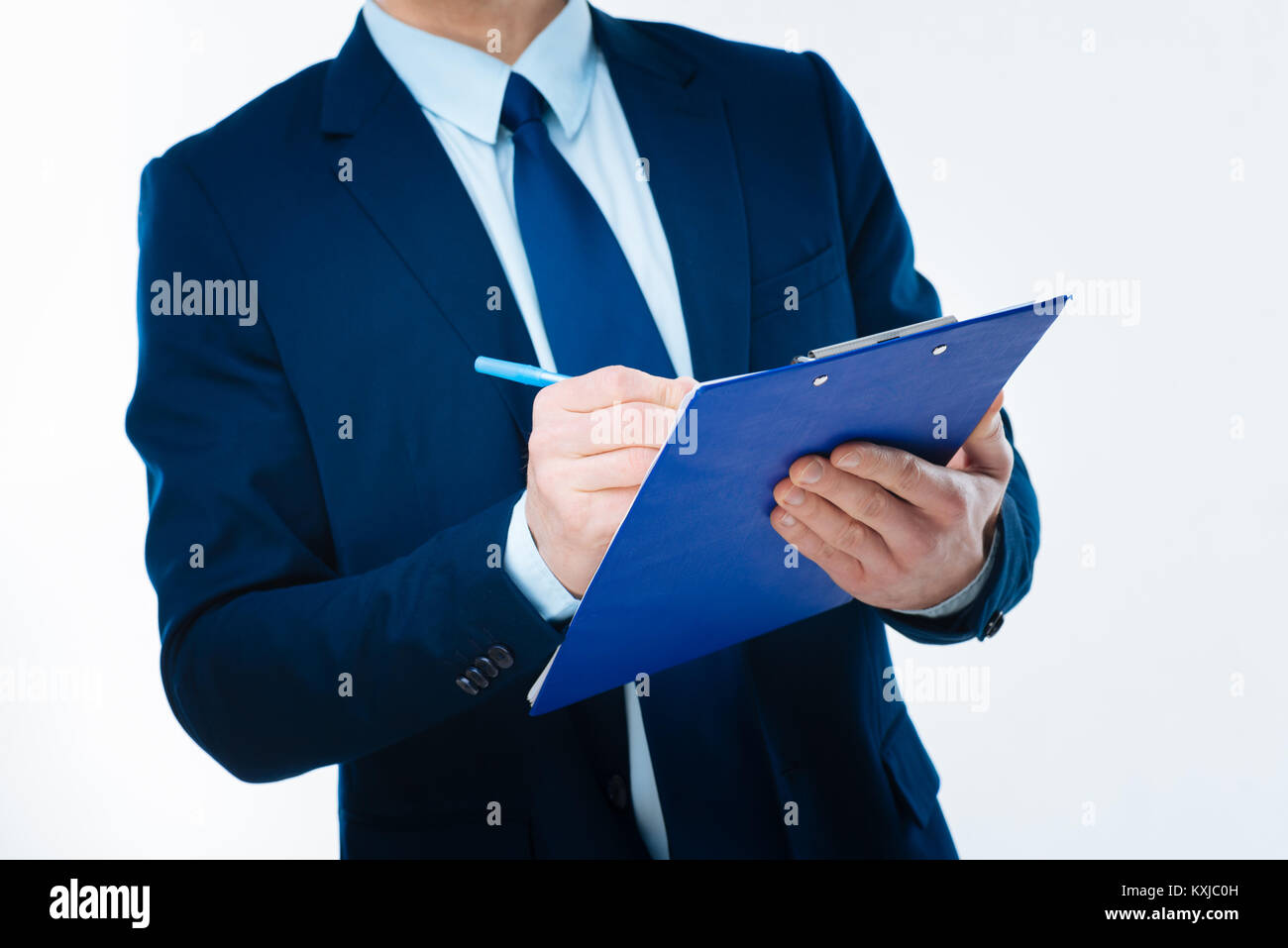 Close up businessman writing documents hi-res stock photography and ...