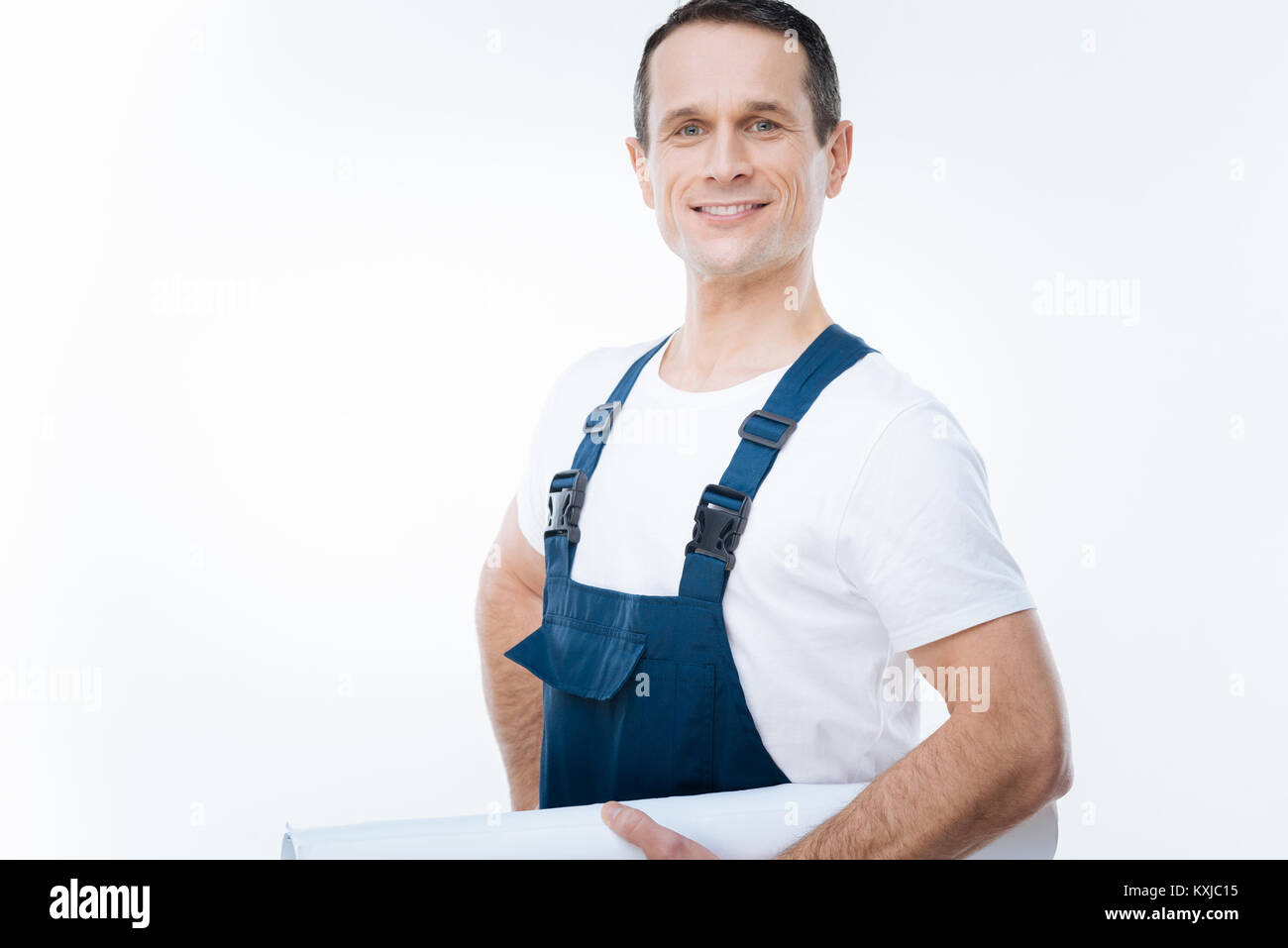Positive happy engineer smiling Stock Photo - Alamy