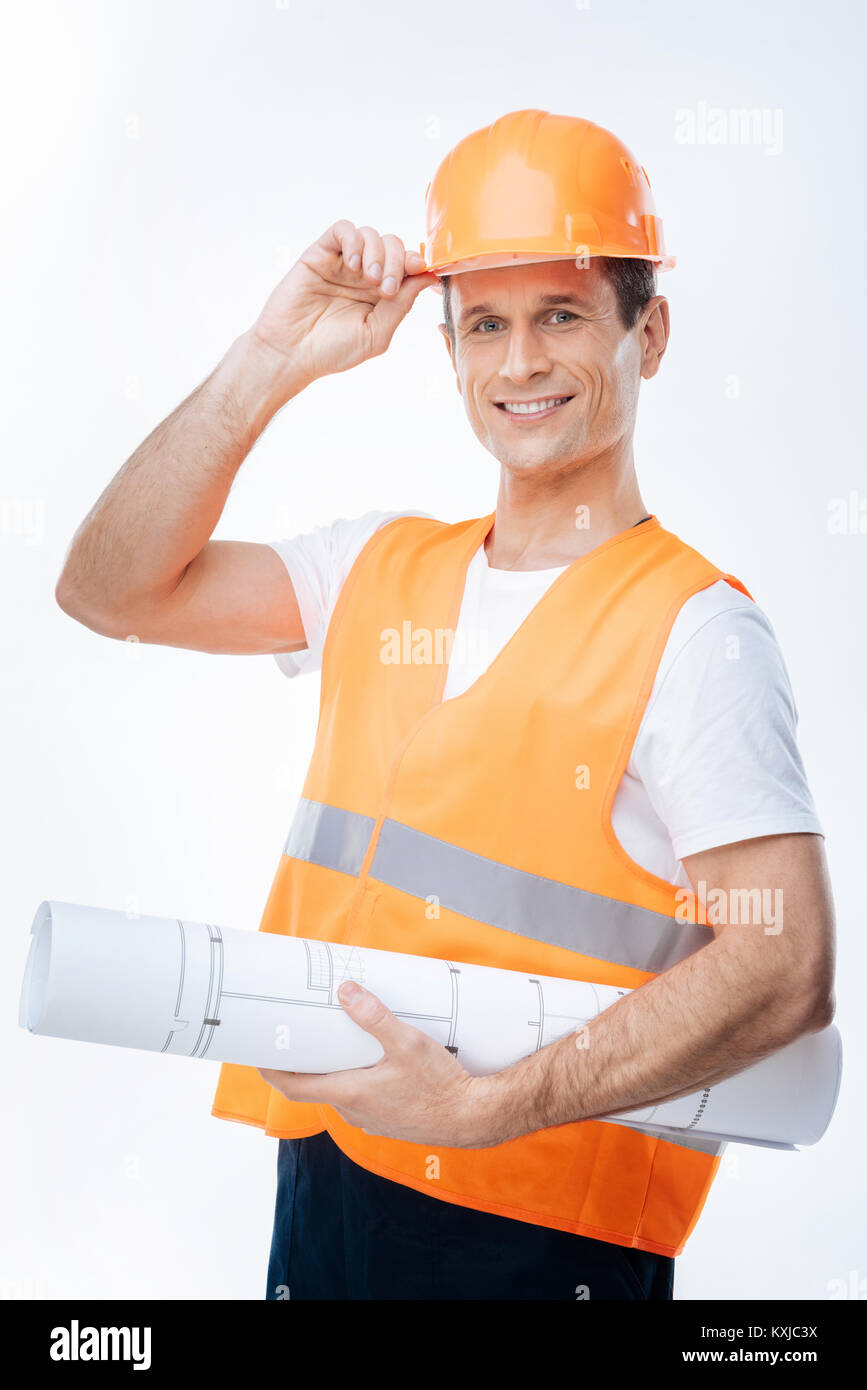 Confident professional engineer holding his blueprint Stock Photo - Alamy