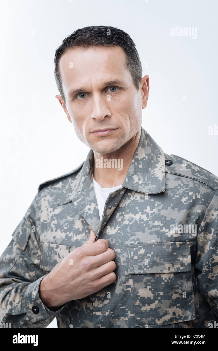 Nice smart man wearing a uniform Stock Photo - Alamy