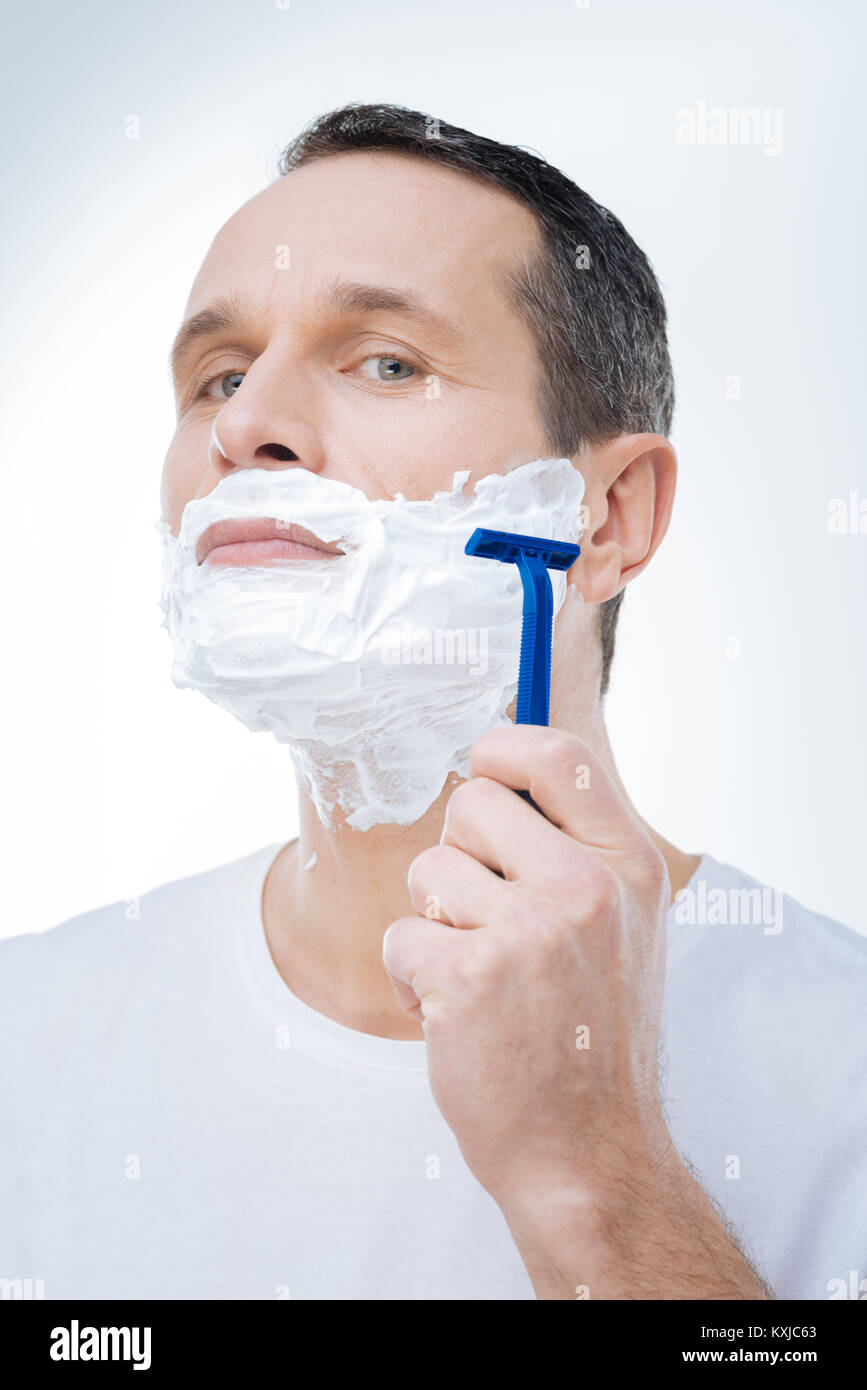 Handsome adult man looking at you Stock Photo - Alamy