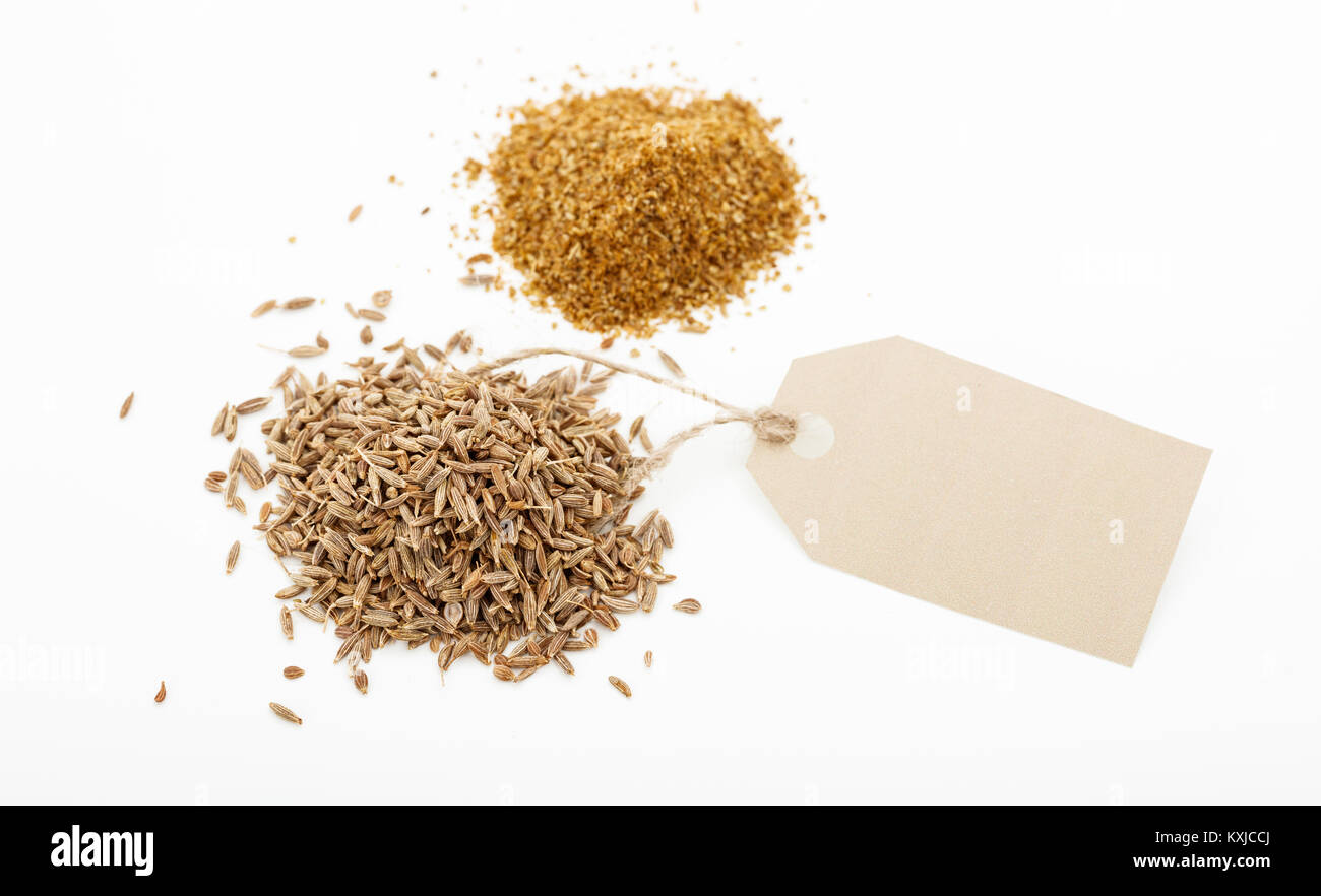 Cumin seeds on white background Stock Photo - Alamy