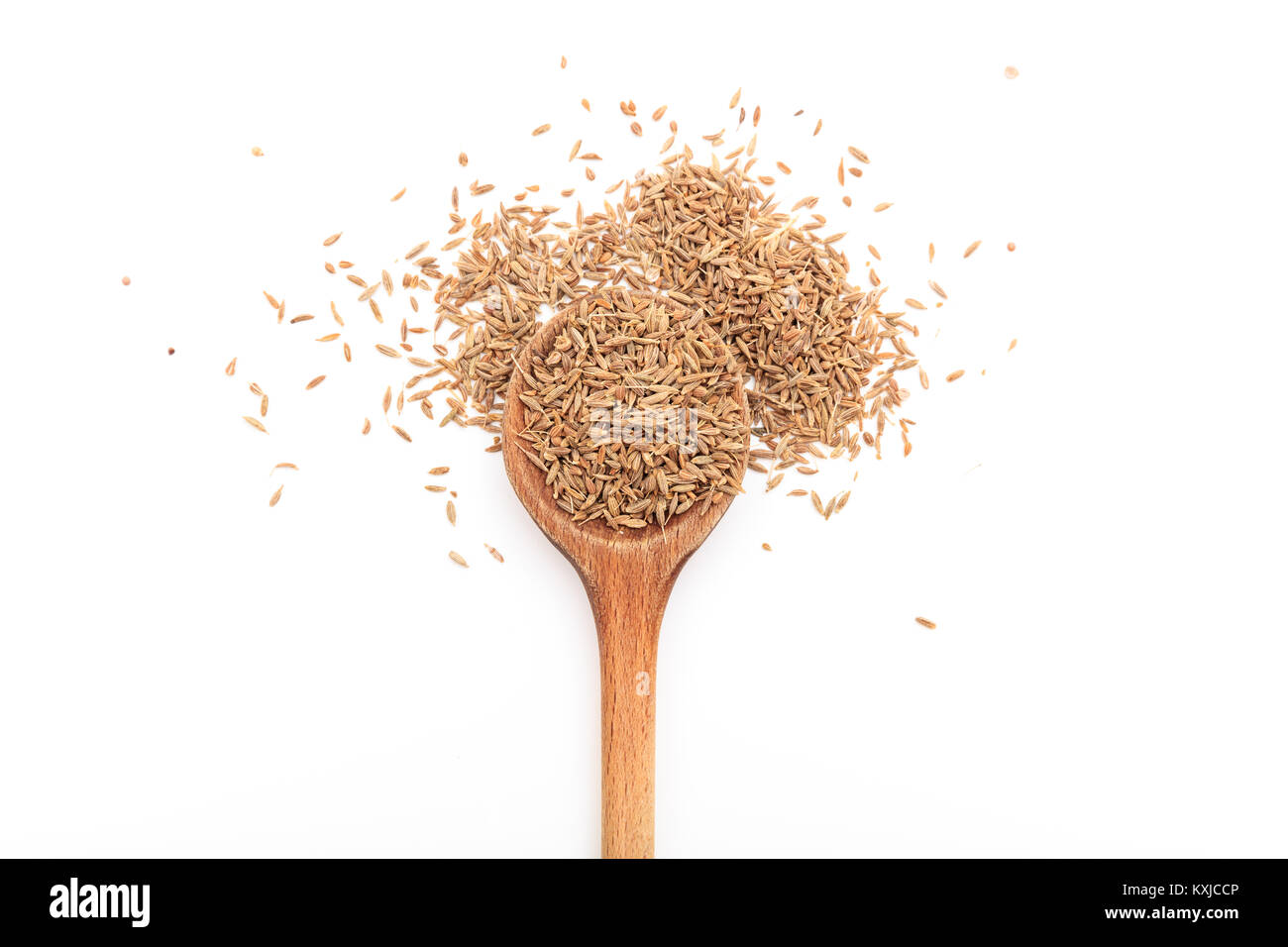 Cumin seeds on white background Stock Photo - Alamy