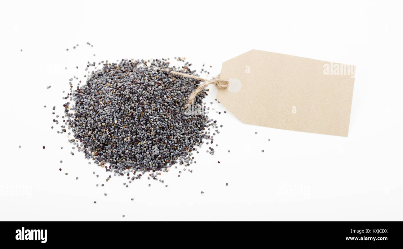 Black poppy seeds with label on white background Stock Photo - Alamy
