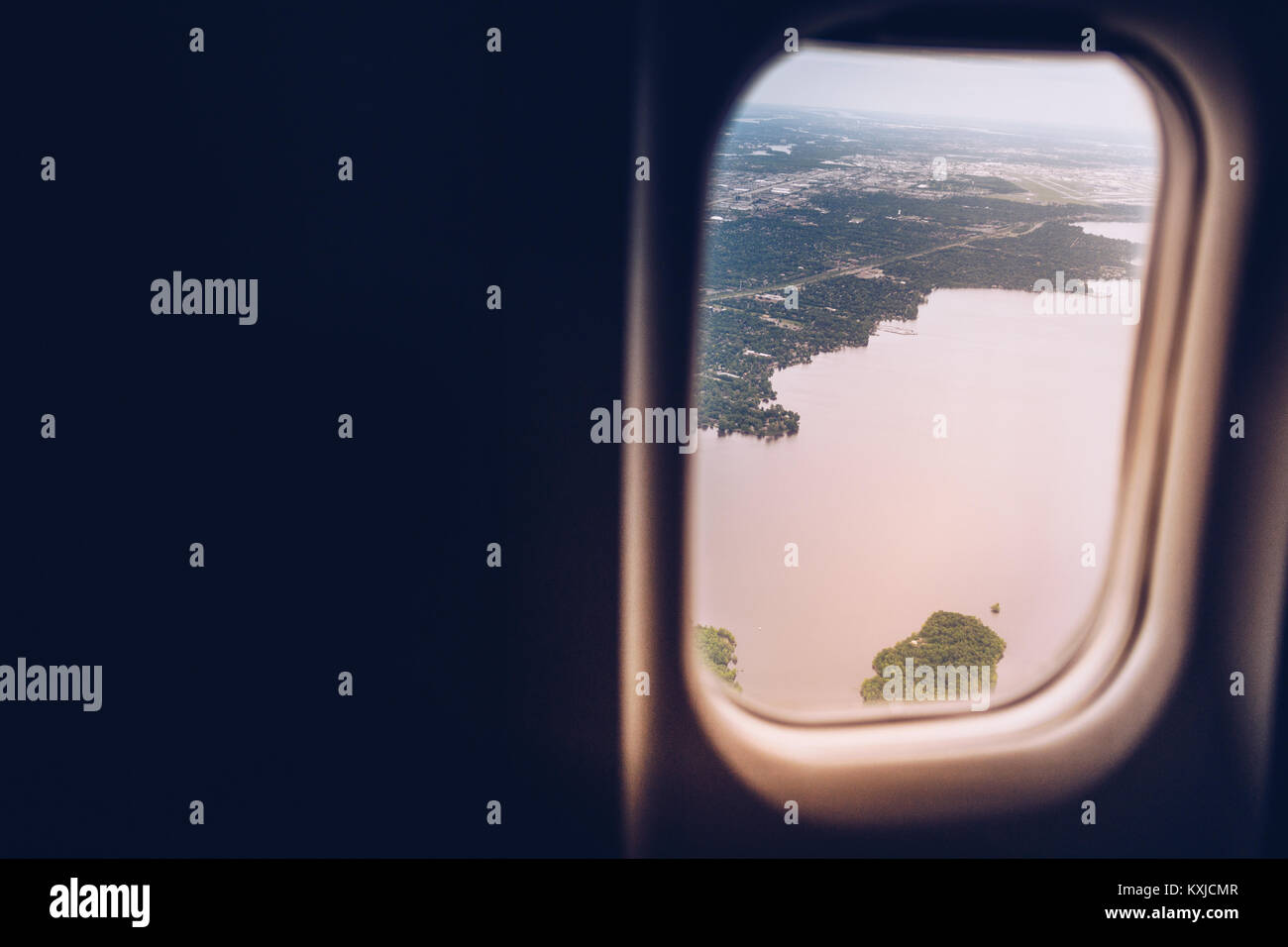 landscape view out through airplane interior window Stock Photo - Alamy