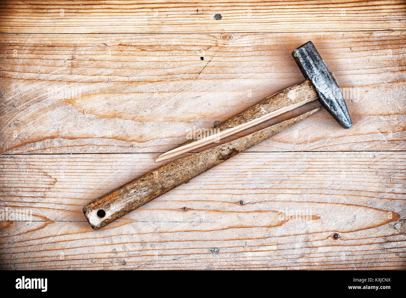 Hammer with a broken handle Stock Photo - Alamy