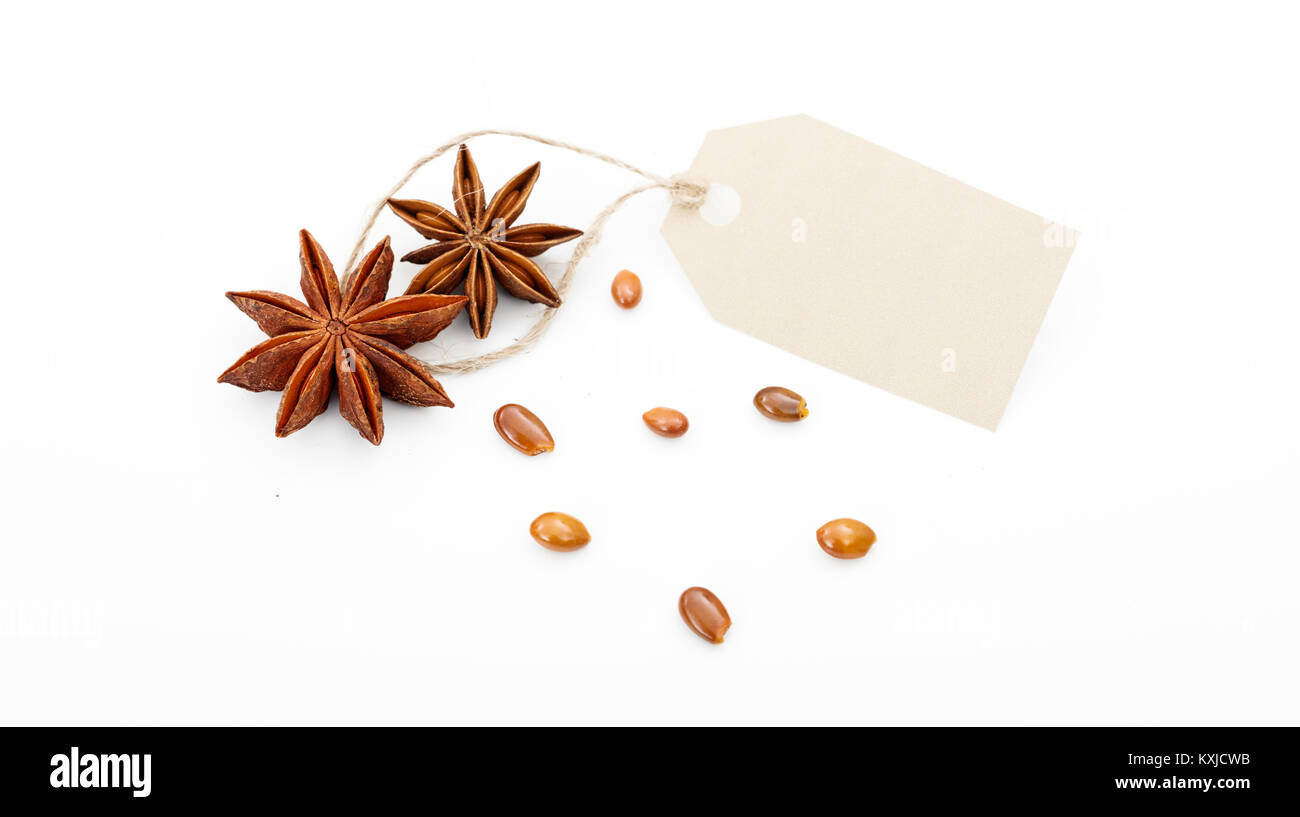 Star anise with a label on a white background Stock Photo - Alamy