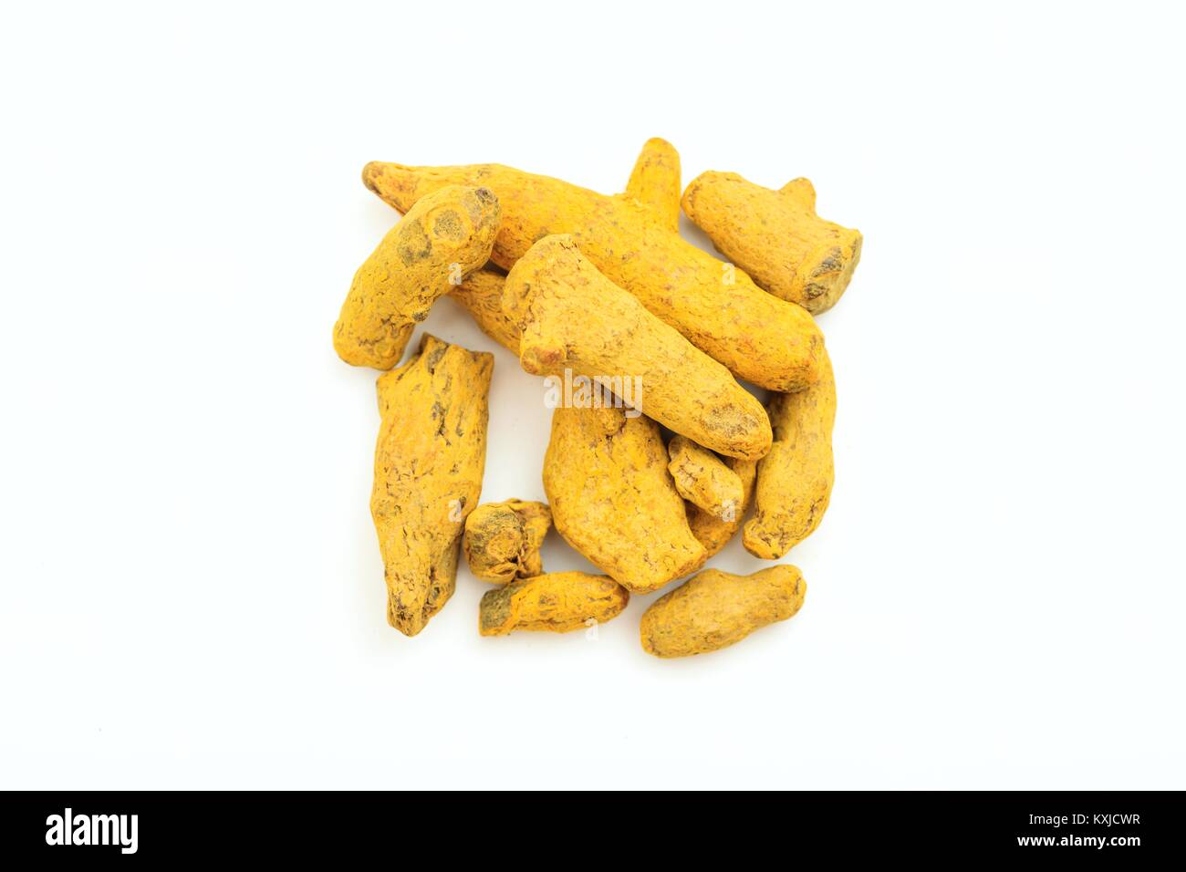 Turmeric seeds in a square shape, on a white background Stock Photo - Alamy