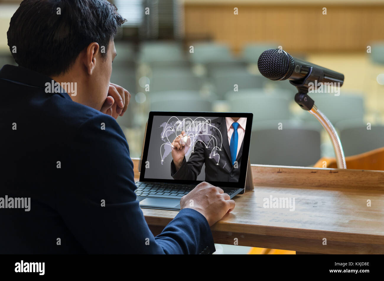 Businessman sitting and using computer laptop showing the connectionon ...