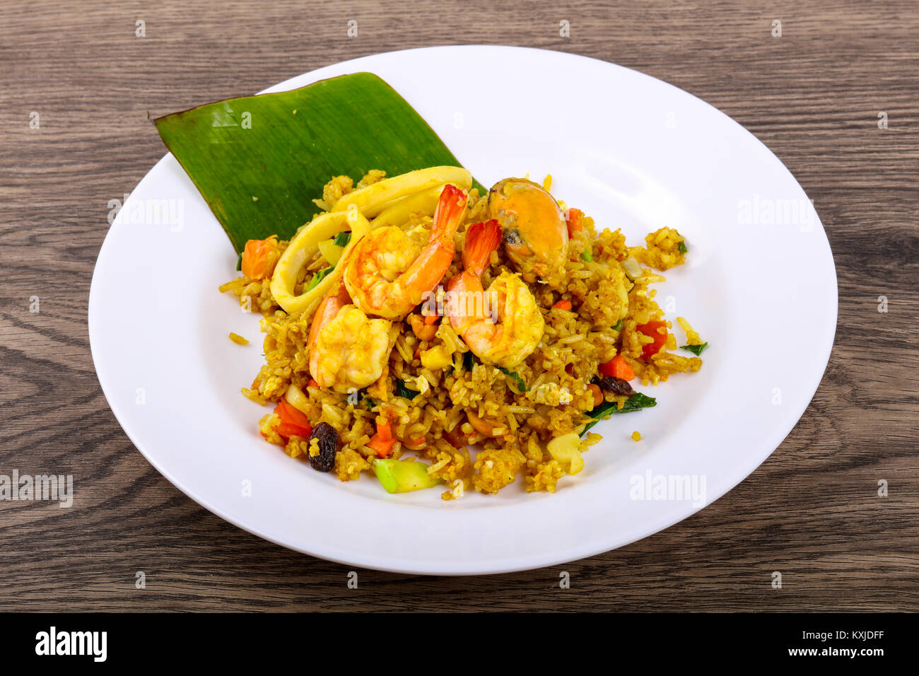 Fried rice with seafood - shrimp, mussel, squid Stock Photo - Alamy