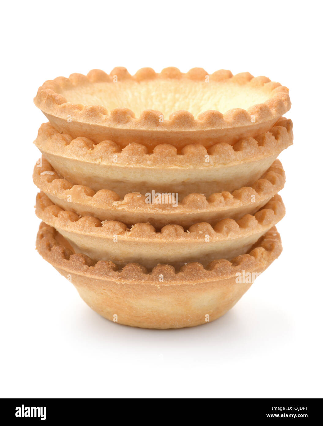 Stack of fresh baked tart shells isolated on white Stock Photo - Alamy